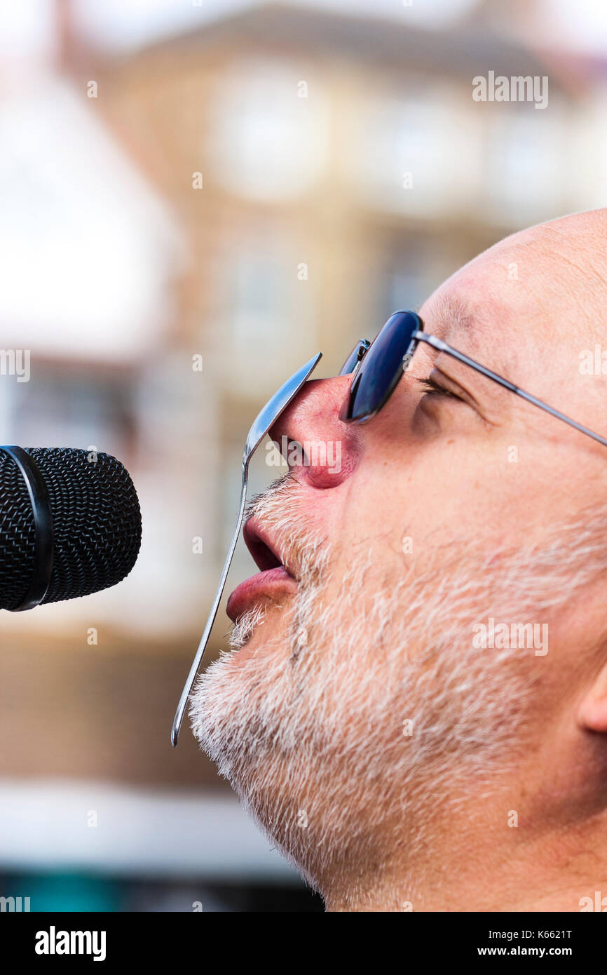 Mick Scott, presenter at Broadstairs Folk Week. Portrait of face, side ...