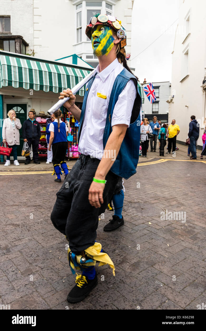 Young man, morris dancer, from Royal Liberty Morris, dancing in street ...
