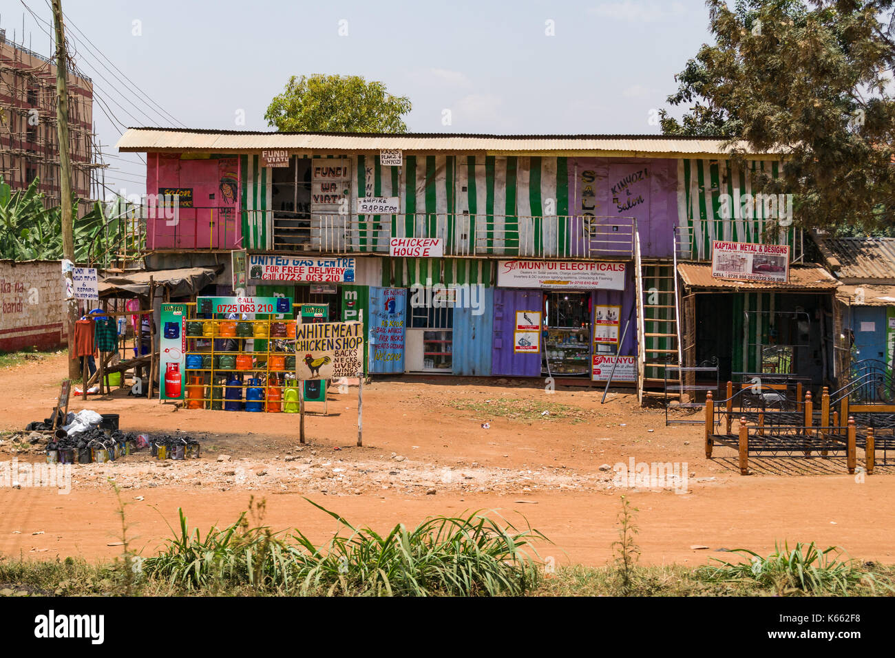 Small block of shops selling various goods and services, Kenya Stock ...