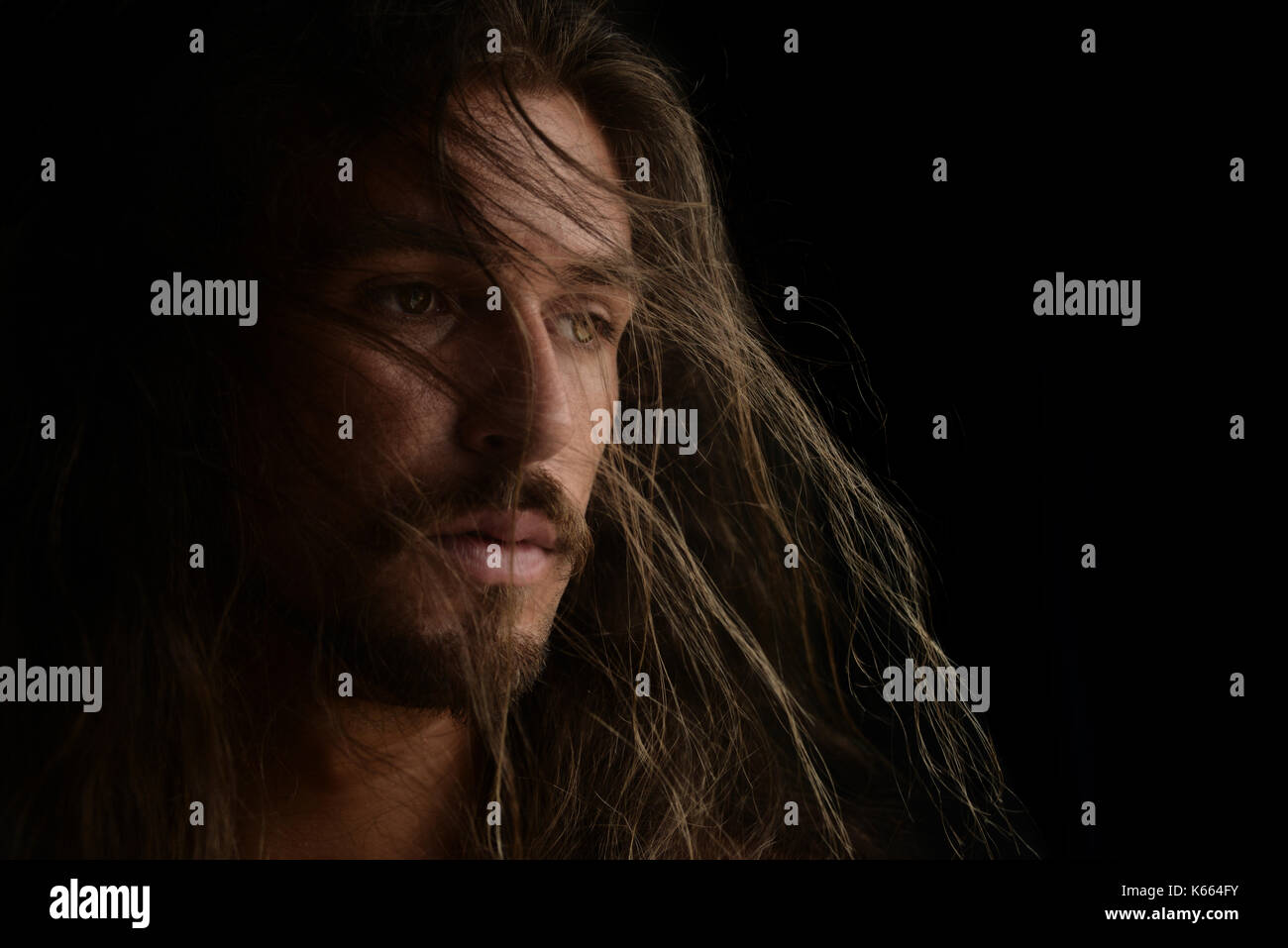 Young guy long hair hi-res stock photography and images - Alamy
