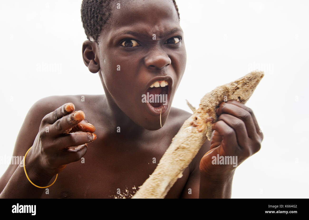 Child holding snake hi-res stock photography and images - Alamy