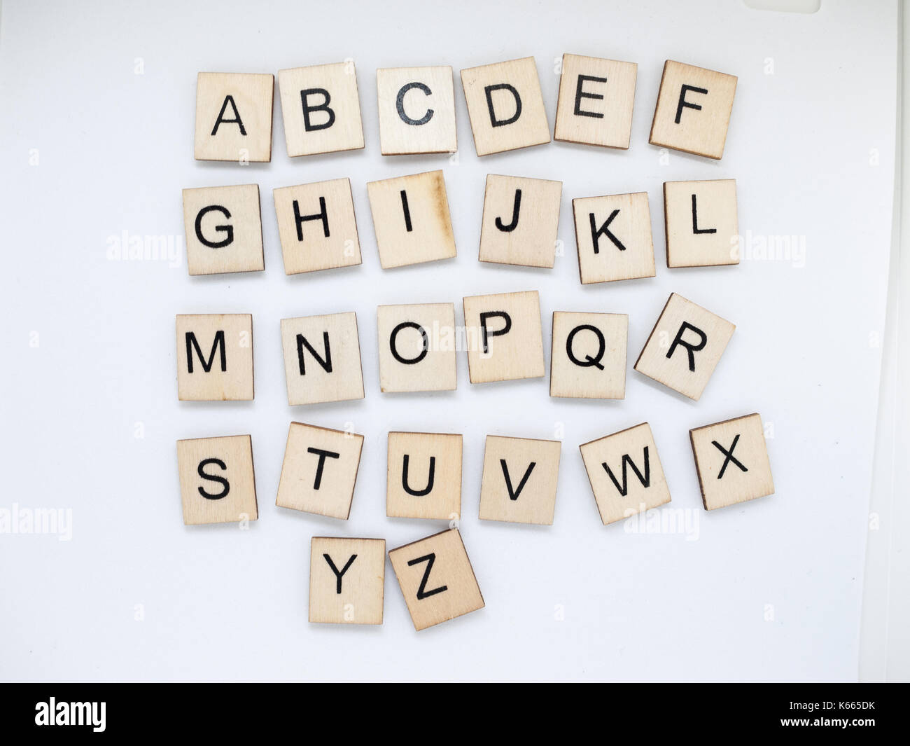 The whole English alphabet laid out with wooden letter tiles Stock ...