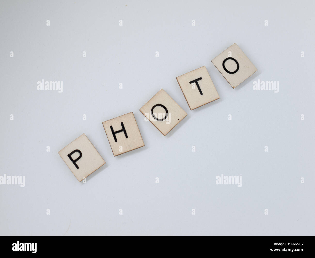 The word "Photo" spelled out with wooden letter tiles Stock Photo - Alamy