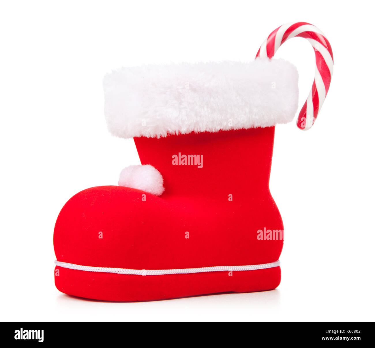 Santa's shoe on white background Stock Photo - Alamy