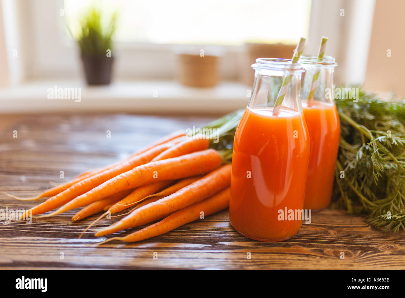 Fresh organic carrot juice Stock Photo - Alamy