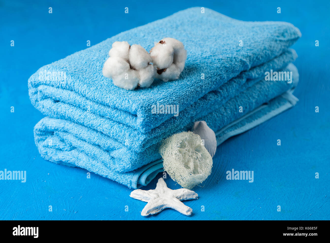 Sponge with bath towel hi-res stock photography and images - Alamy