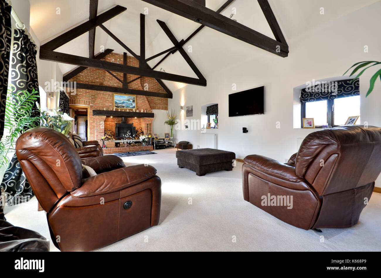 Large luxury living room barn conversion Stock Photo - Alamy