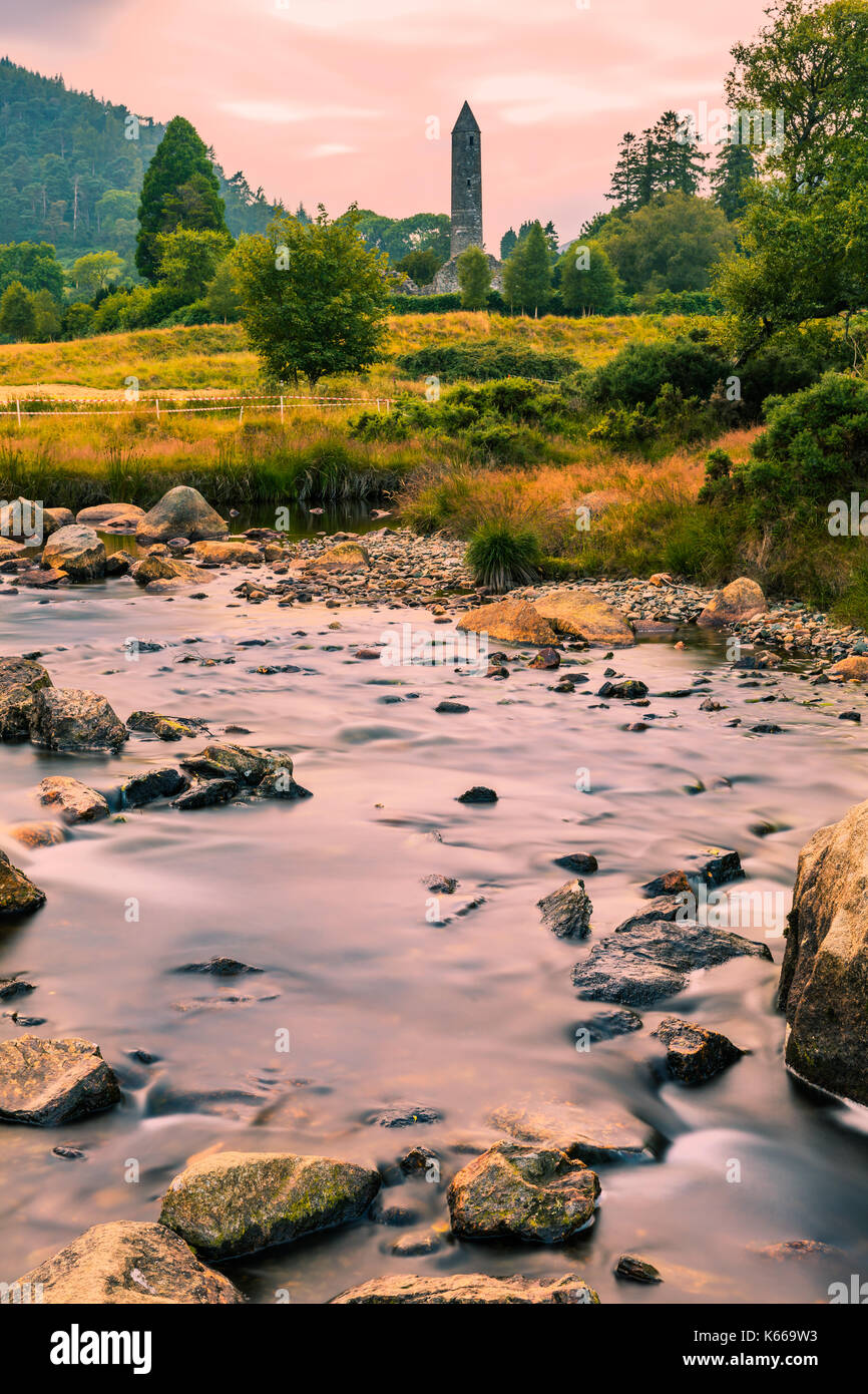 The round tower at Glendalough in County Wicklow, Ireland, renowned for ...