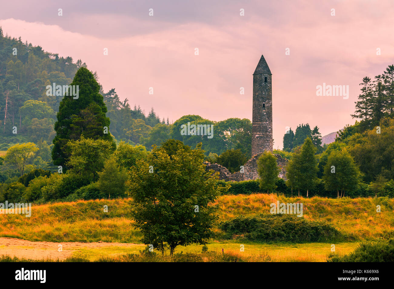 The round tower at Glendalough in County Wicklow, Ireland, renowned for ...