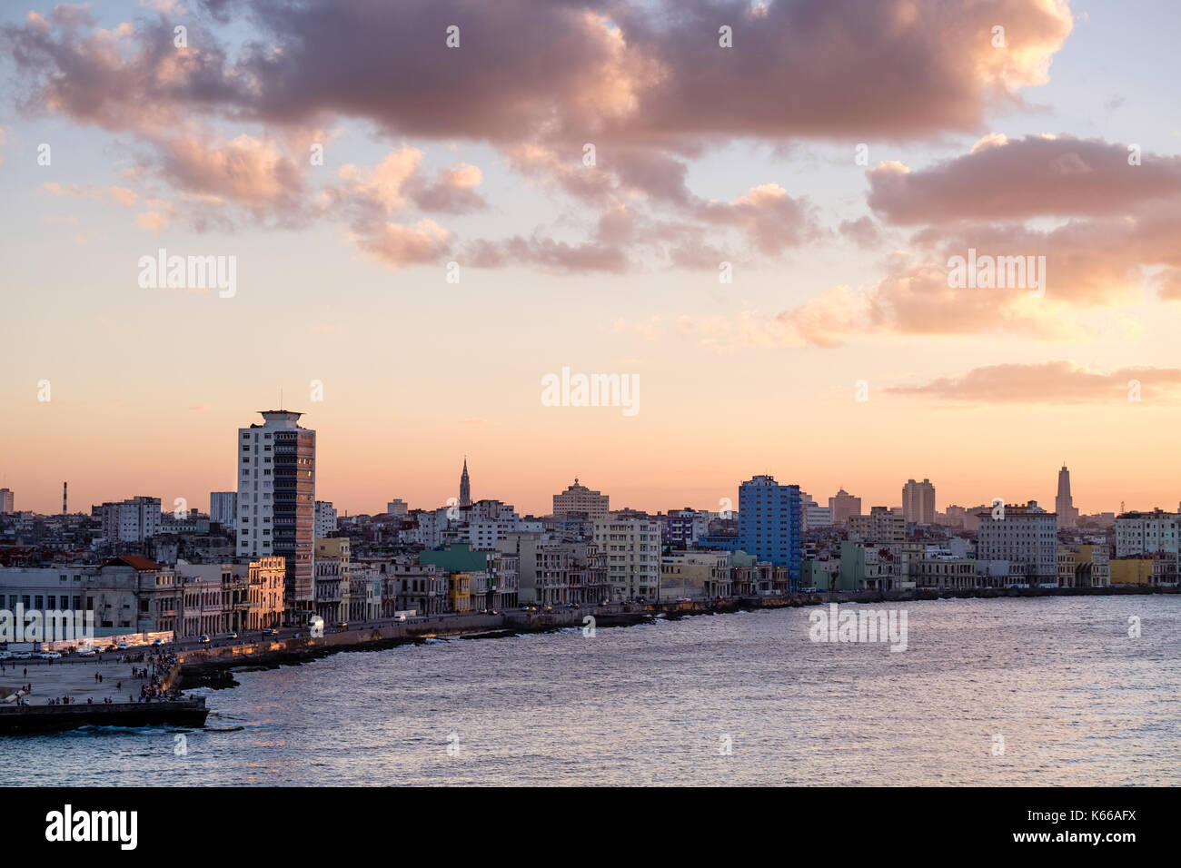 Sunset in Havana with a view of the seaside city skyline and malecon ...