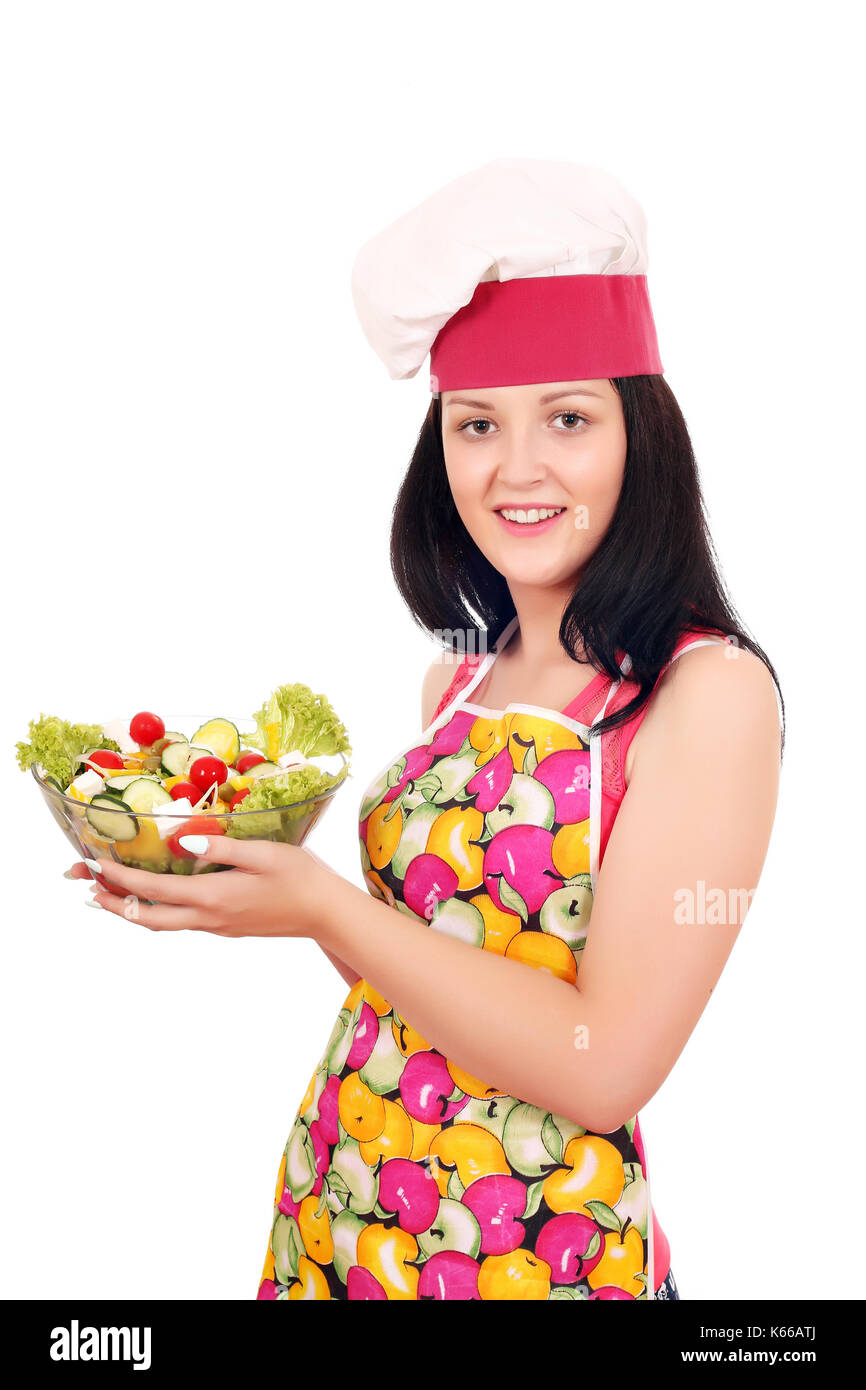 beautiful girl cook holding dish with salad Stock Photo - Alamy