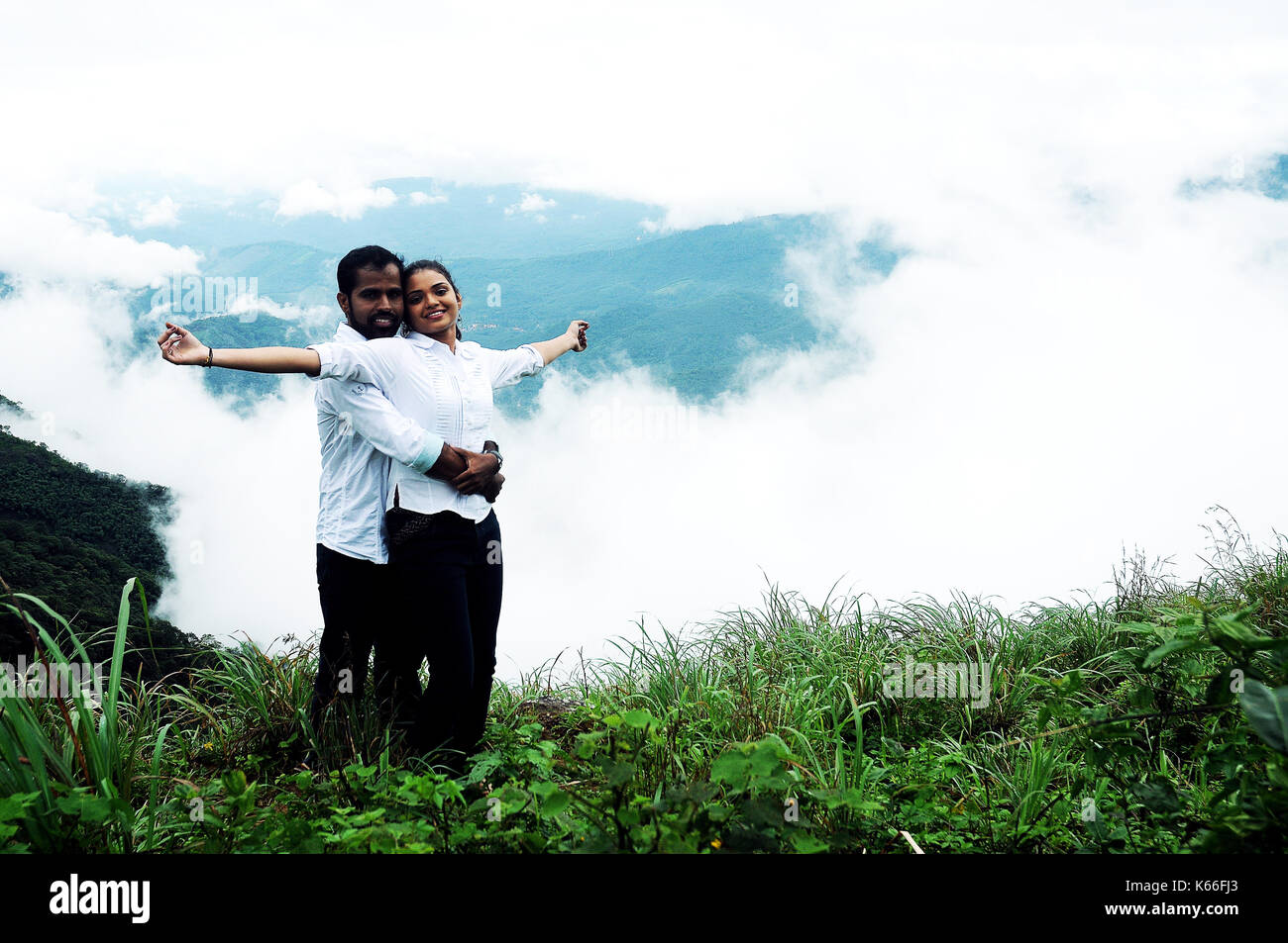Hugging couple in high mountains, couple hugging in beautiful mountains ...