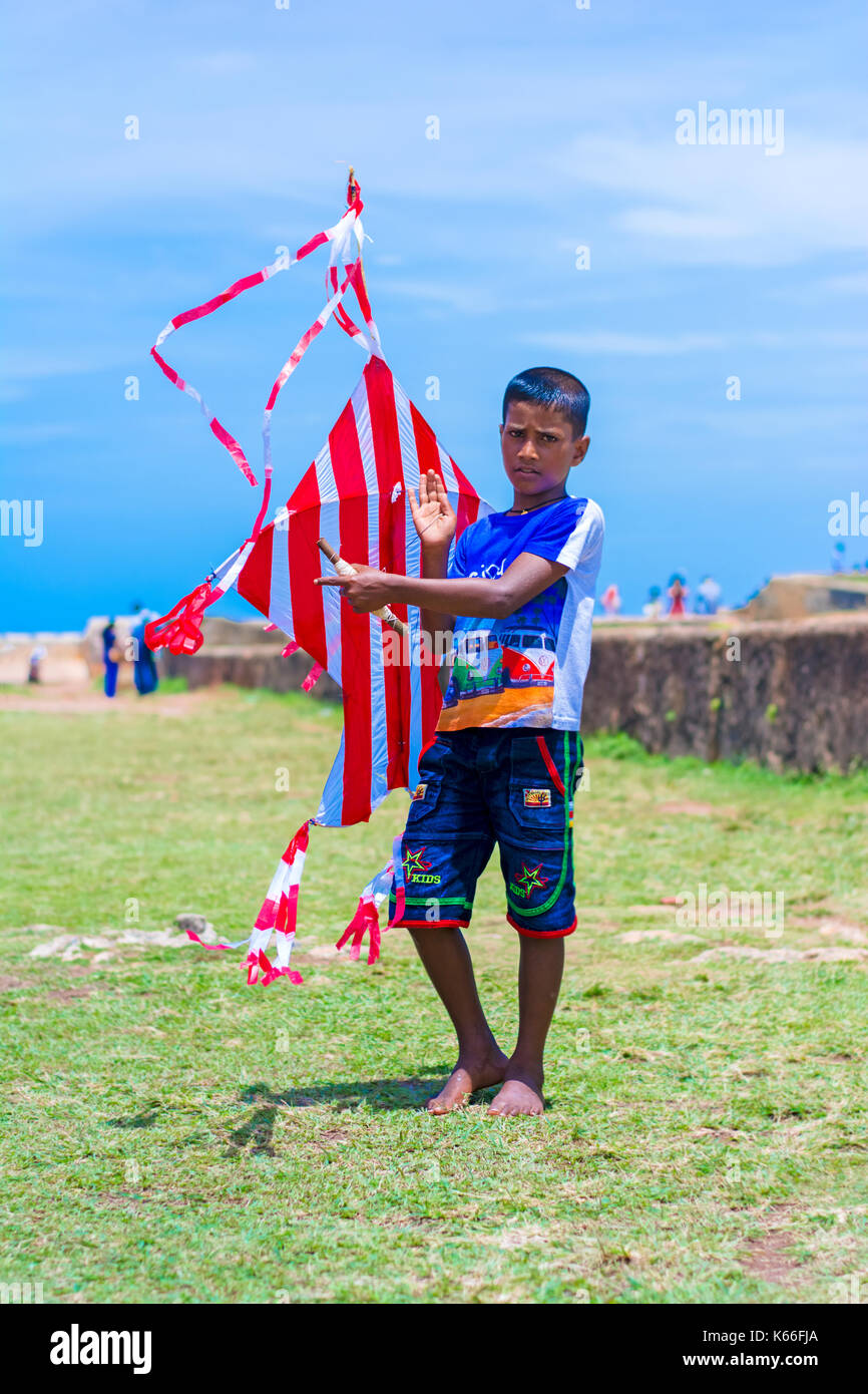 Little boy with colorful kite on the field at Galle Dutch fort Stock ...