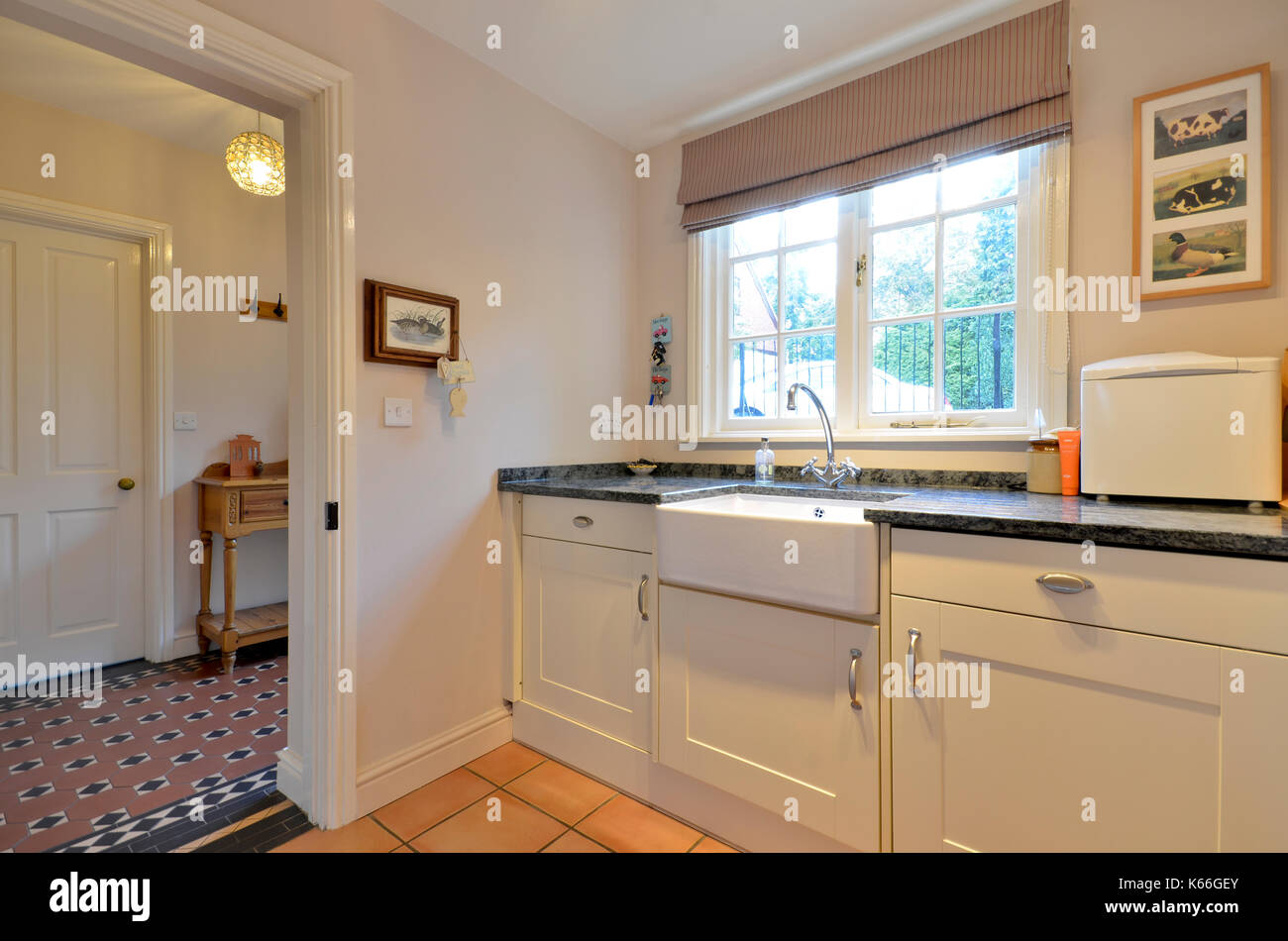 Utility area with belfast sink Stock Photo - Alamy