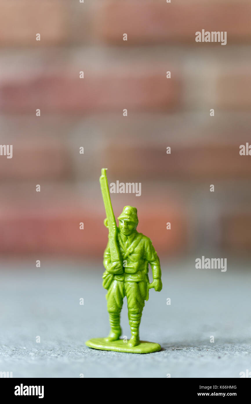 Close up of a single plastic army man soldier holding a rifle Stock ...