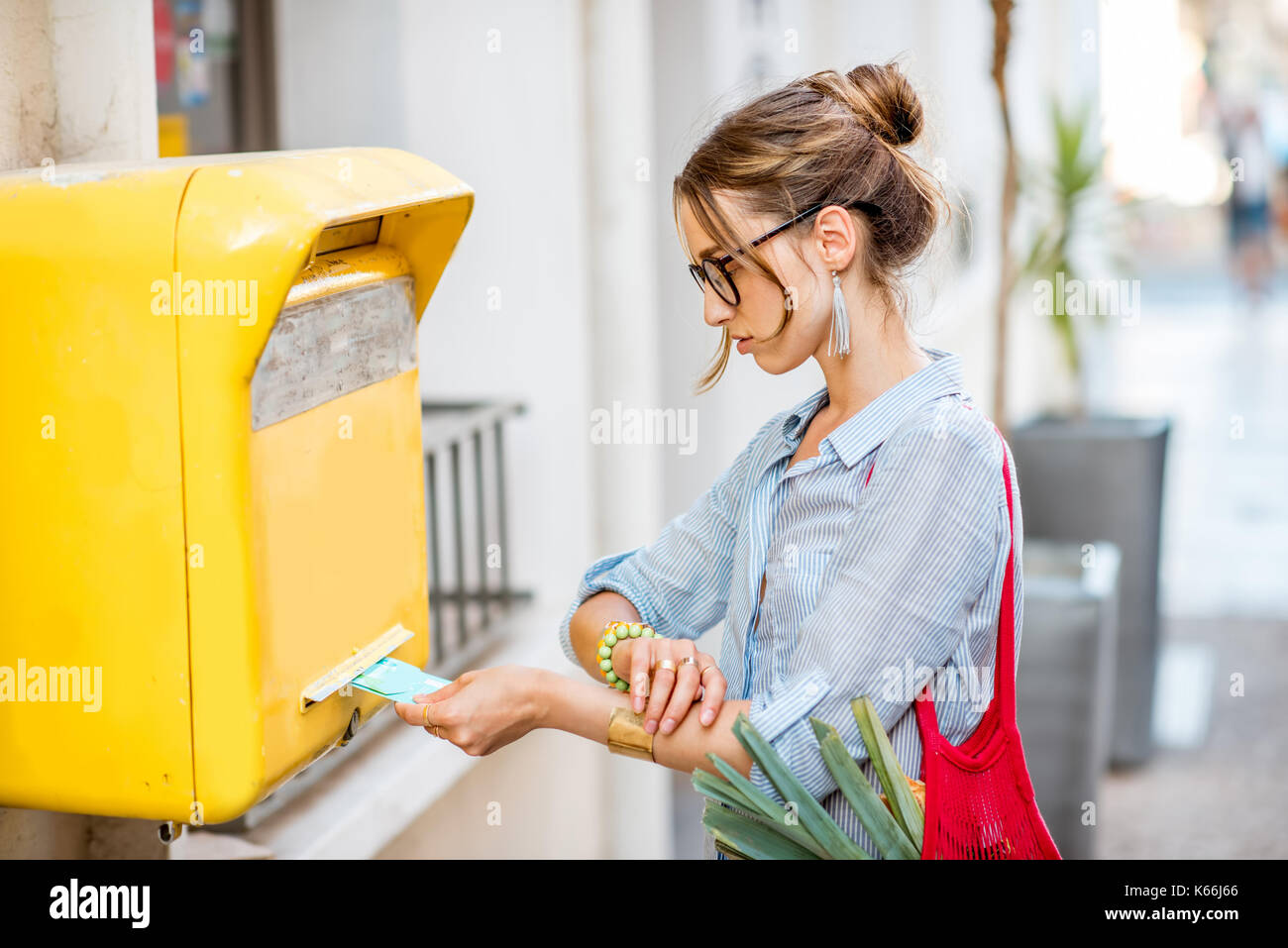 Person Mailing A Letter