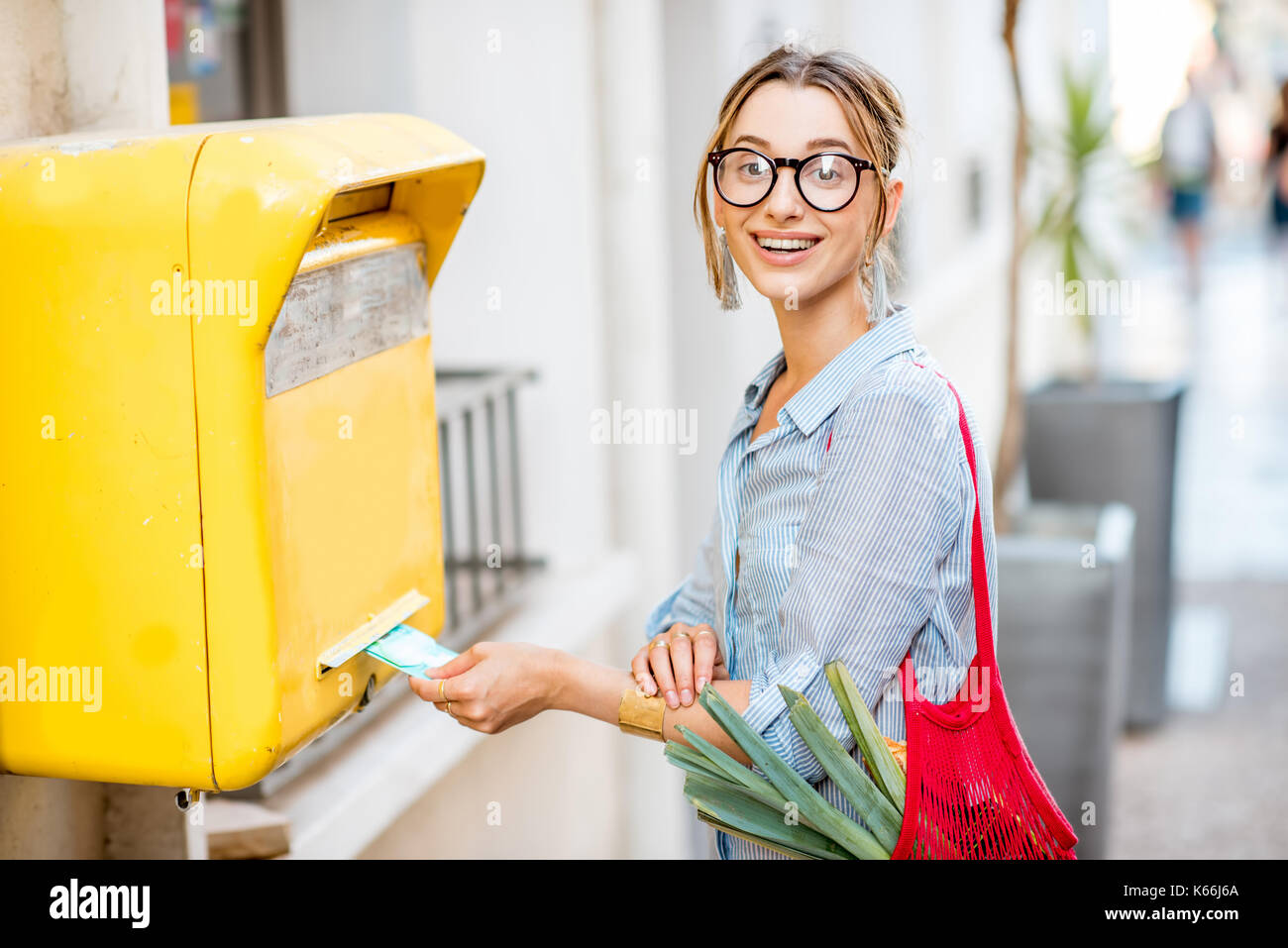 Old woman post letter hi-res stock photography and images - Alamy