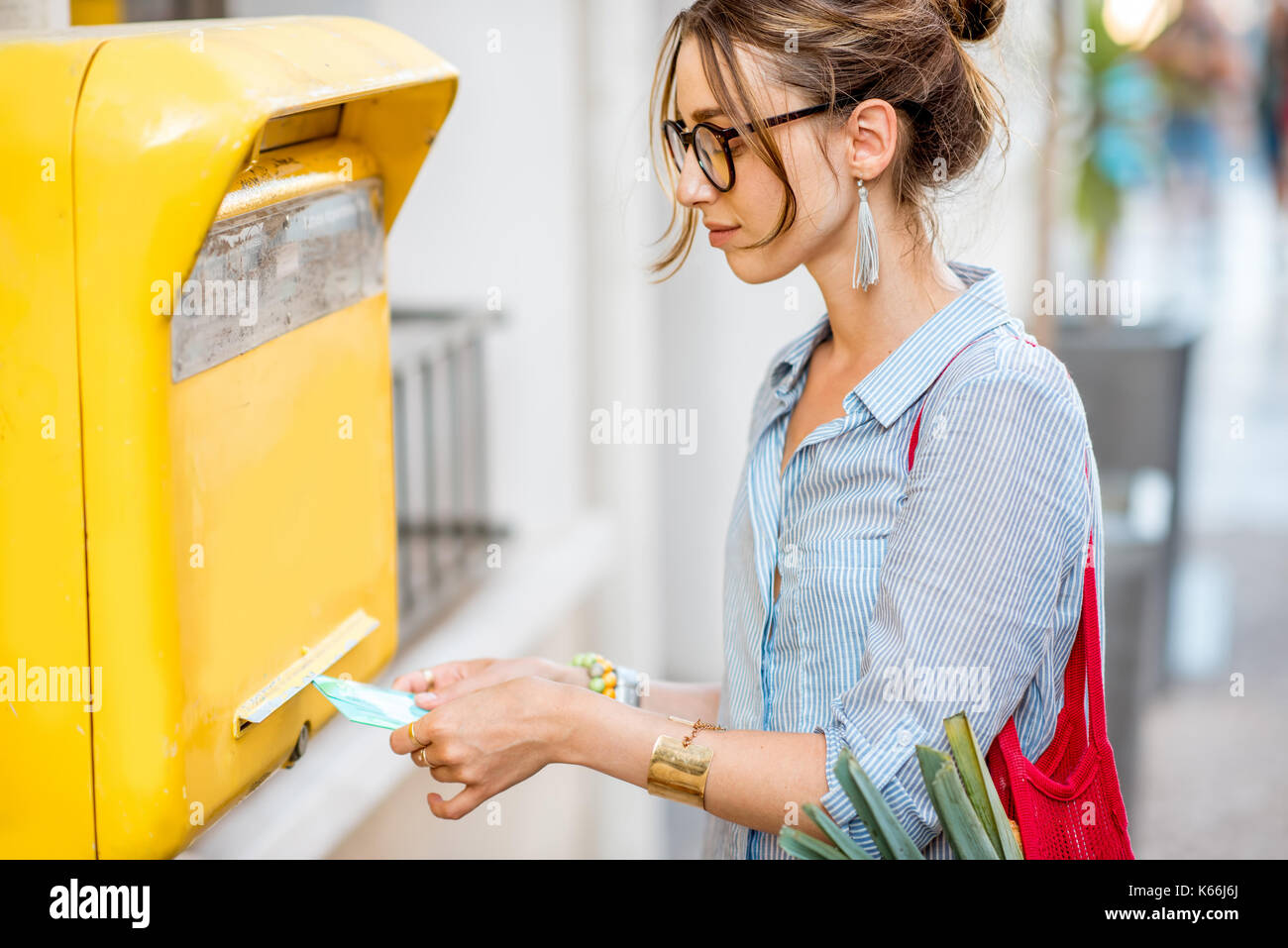 Old woman post letter hi-res stock photography and images - Alamy