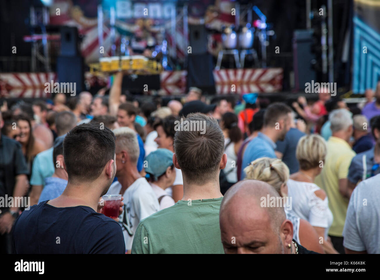 People looking out at stage in Montreal, summer event in Quebec Canada ...