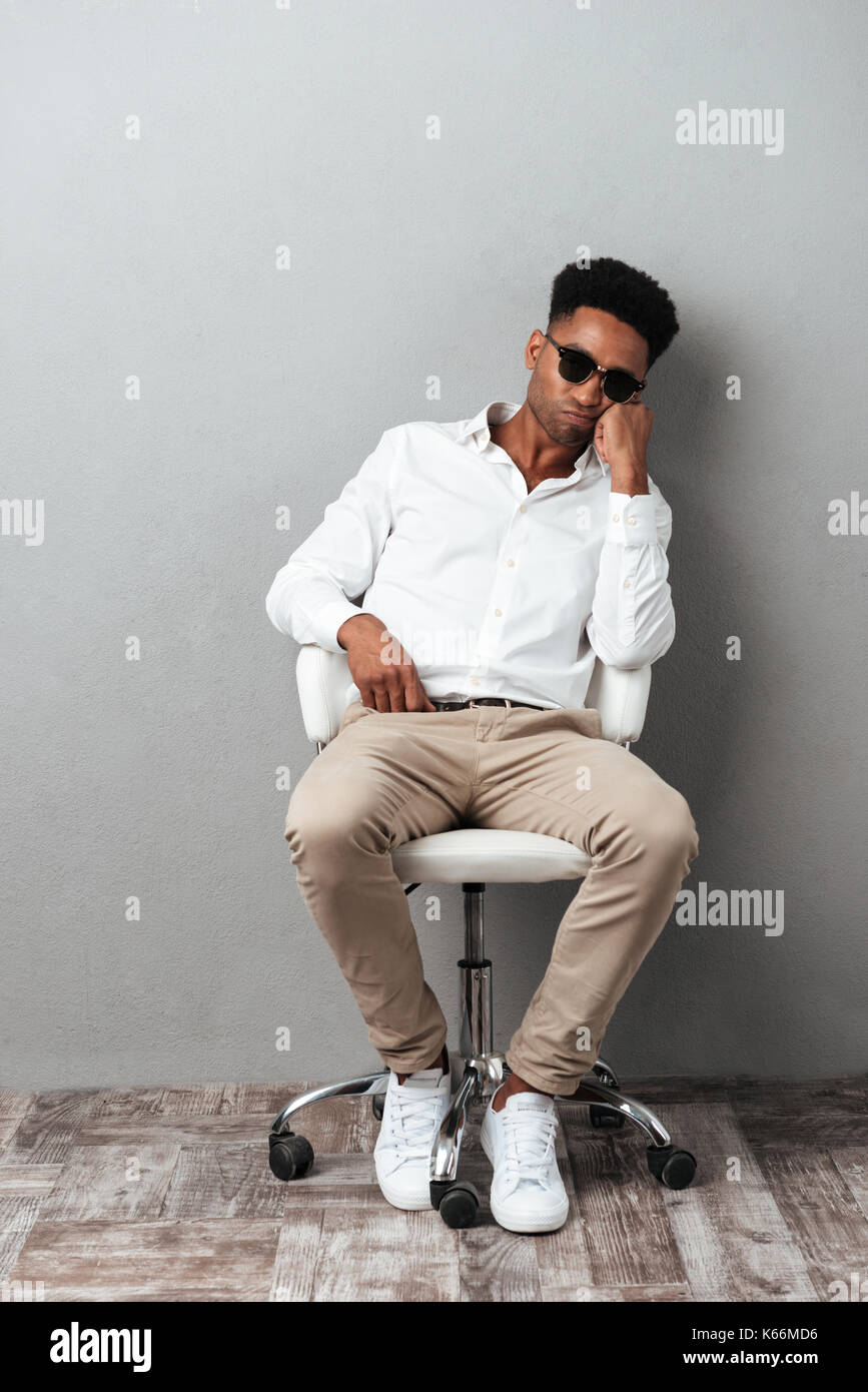 Man bored chair hi-res stock photography and images - Alamy