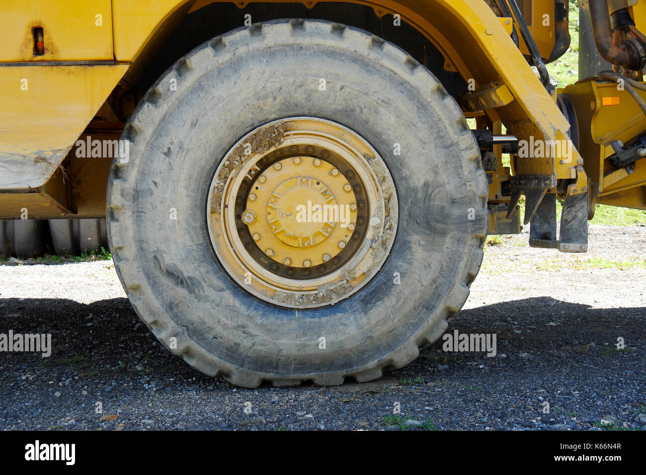 a wheel and tire of a construction vehicle Stock Photo - Alamy