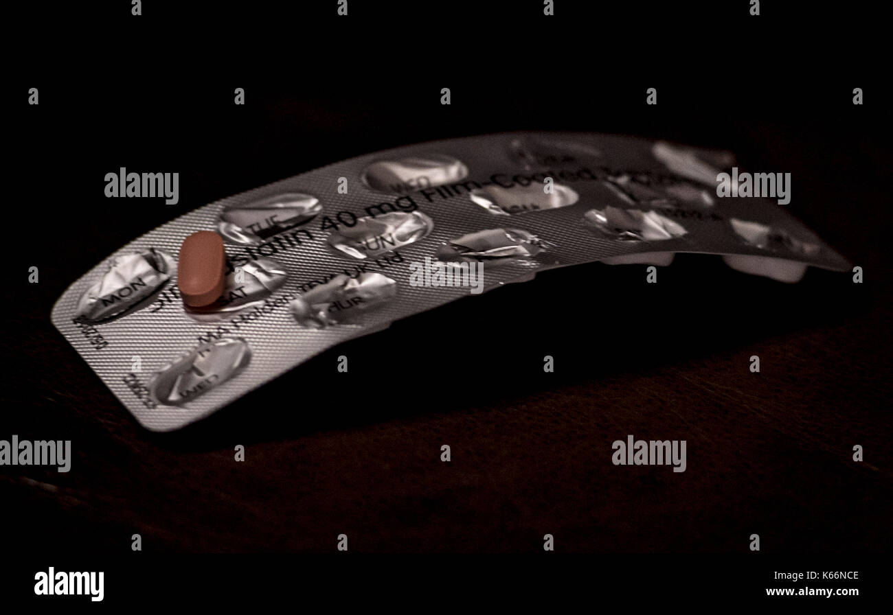 A statin tablet on an empty packet Stock Photo - Alamy