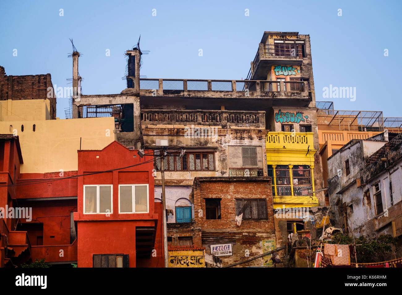 VARANASI, INDIA - CIRCA NOVEMBER 2016: Typical houses over the Ganges ...