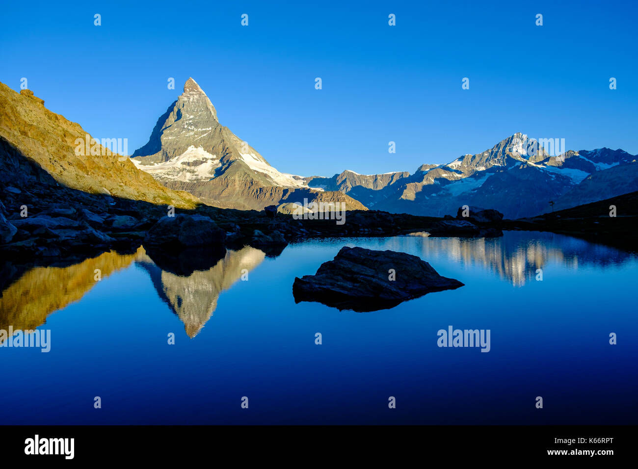 The East Face of the Matterhorn, Monte Cervino, mirroring in the Lake ...