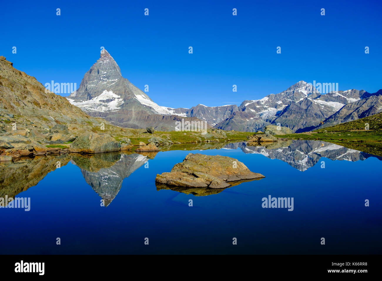 The East Face of the Matterhorn, Monte Cervino, mirroring in the Lake ...