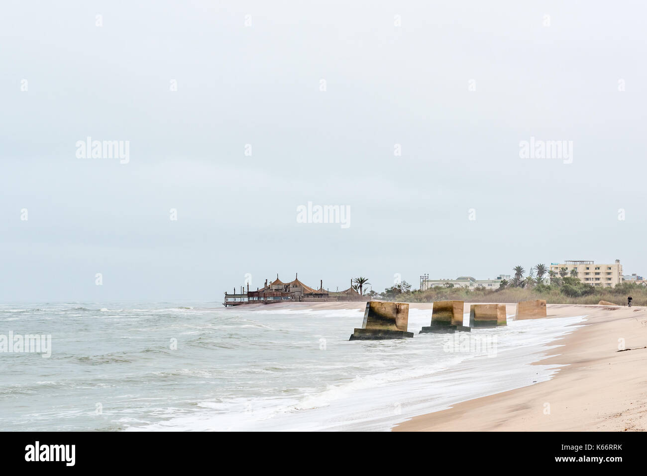 SWAKOPMUND, NAMIBIA - JUNE 30, 2017: Pillars of the old railroad bridge ...