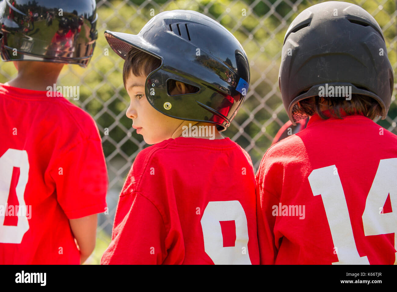 Mixed Race boy playing baseball Stock Photo - Alamy
