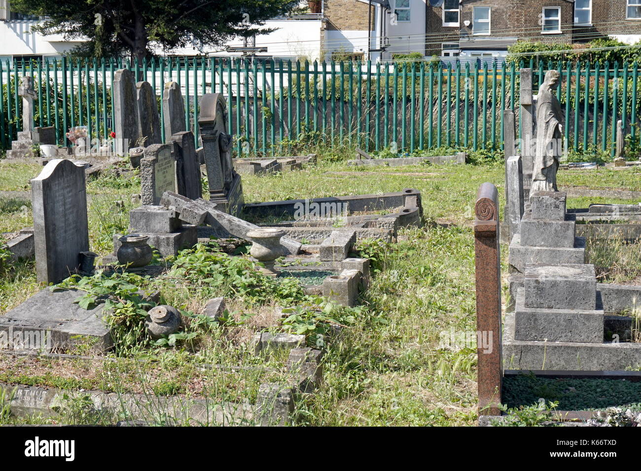 Graves with the fence around the railway tracks at Saint Mary's ...