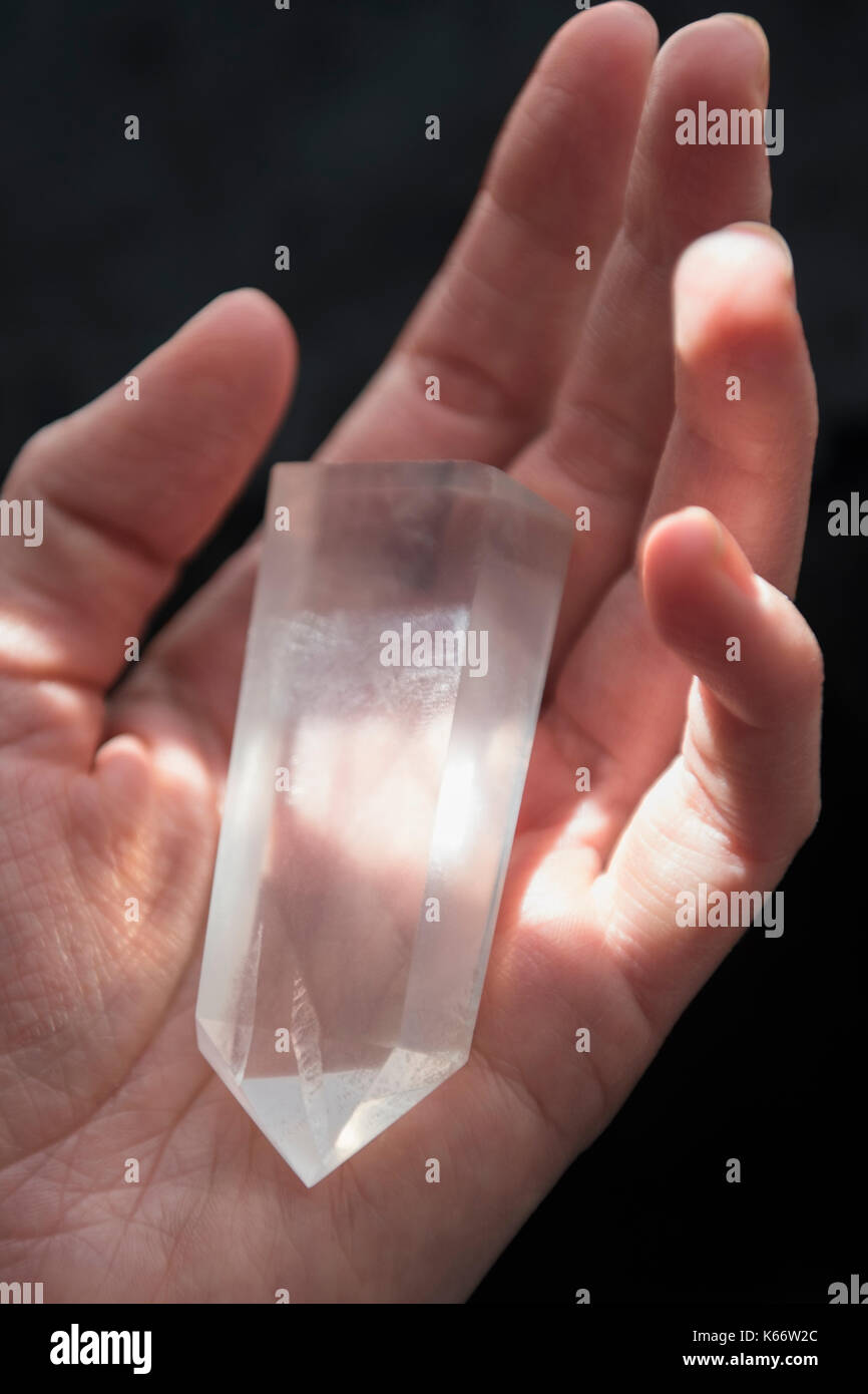 Female hand holding gemstone hi-res stock photography and images - Alamy
