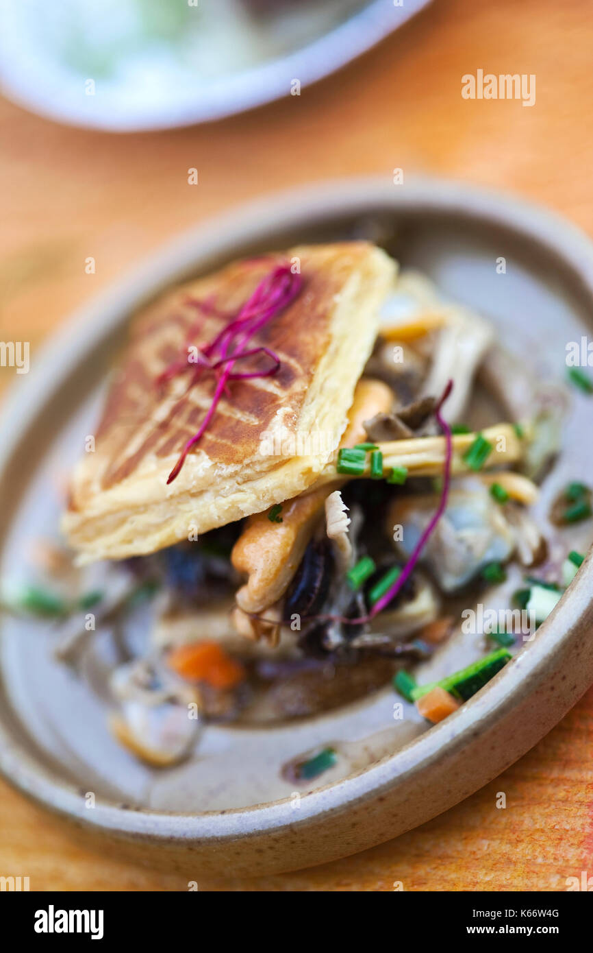 Mussels and shellfish dishes with puff pastry Stock Photo - Alamy