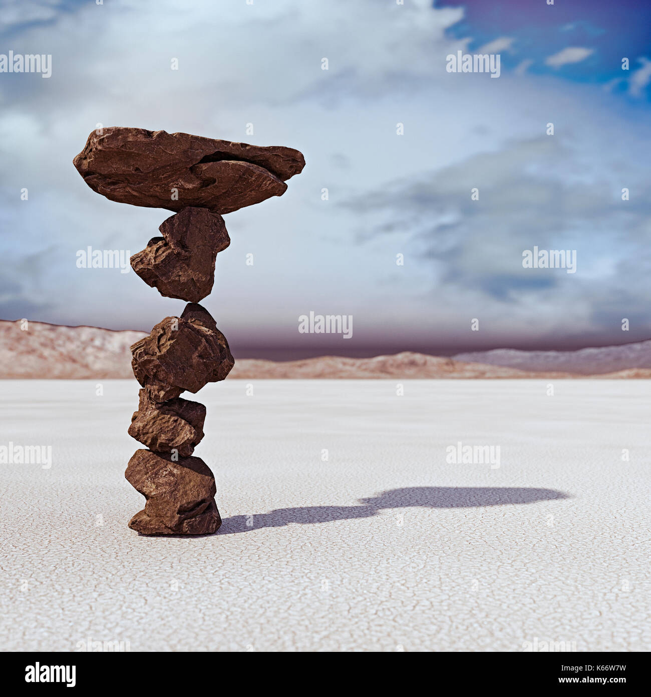 Rocks balancing in desert Stock Photo - Alamy