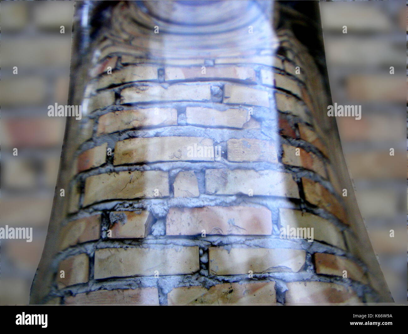 Brick wall through the glass Stock Photo - Alamy