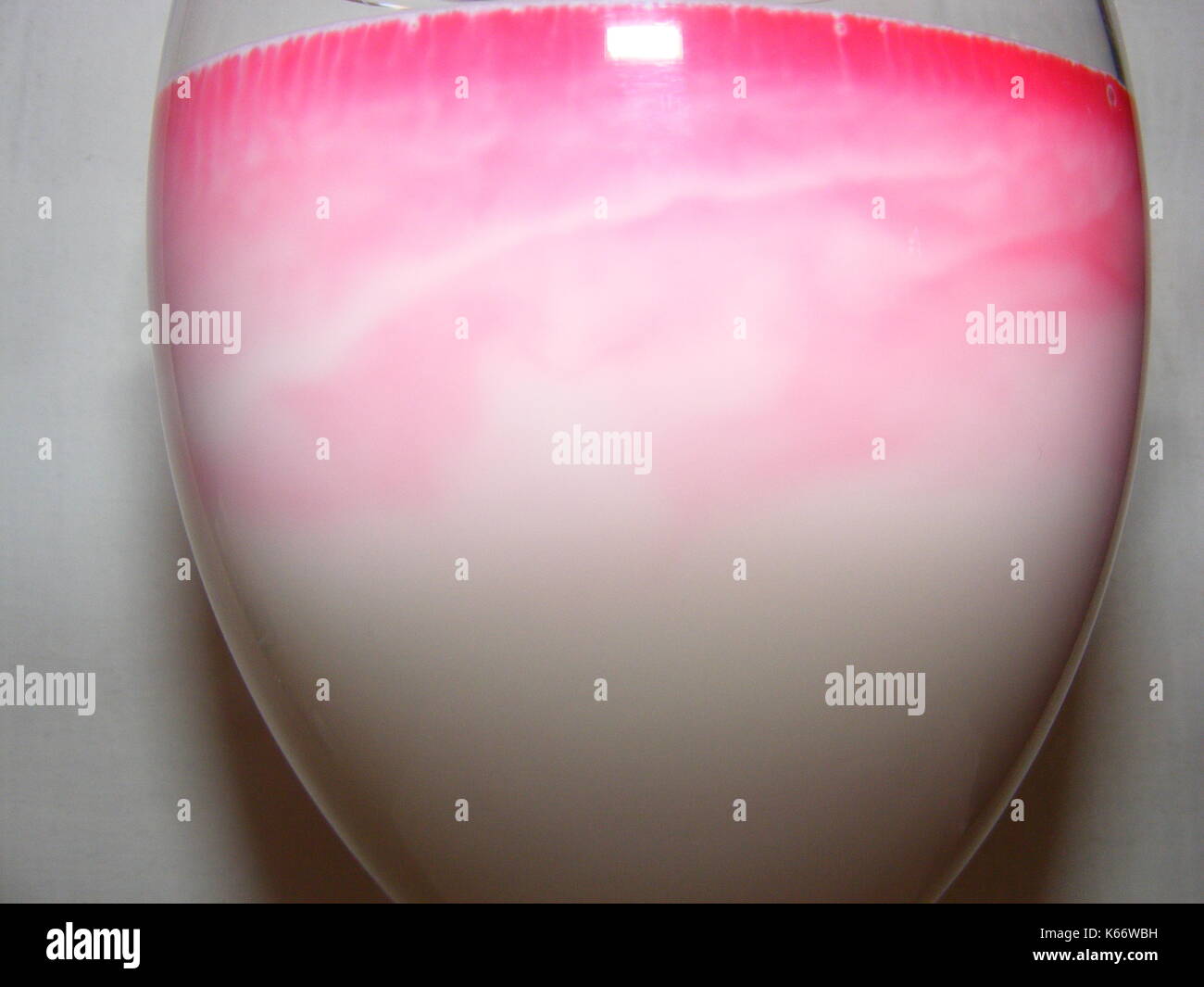 Liquid water and oil drops in milk Stock Photo - Alamy