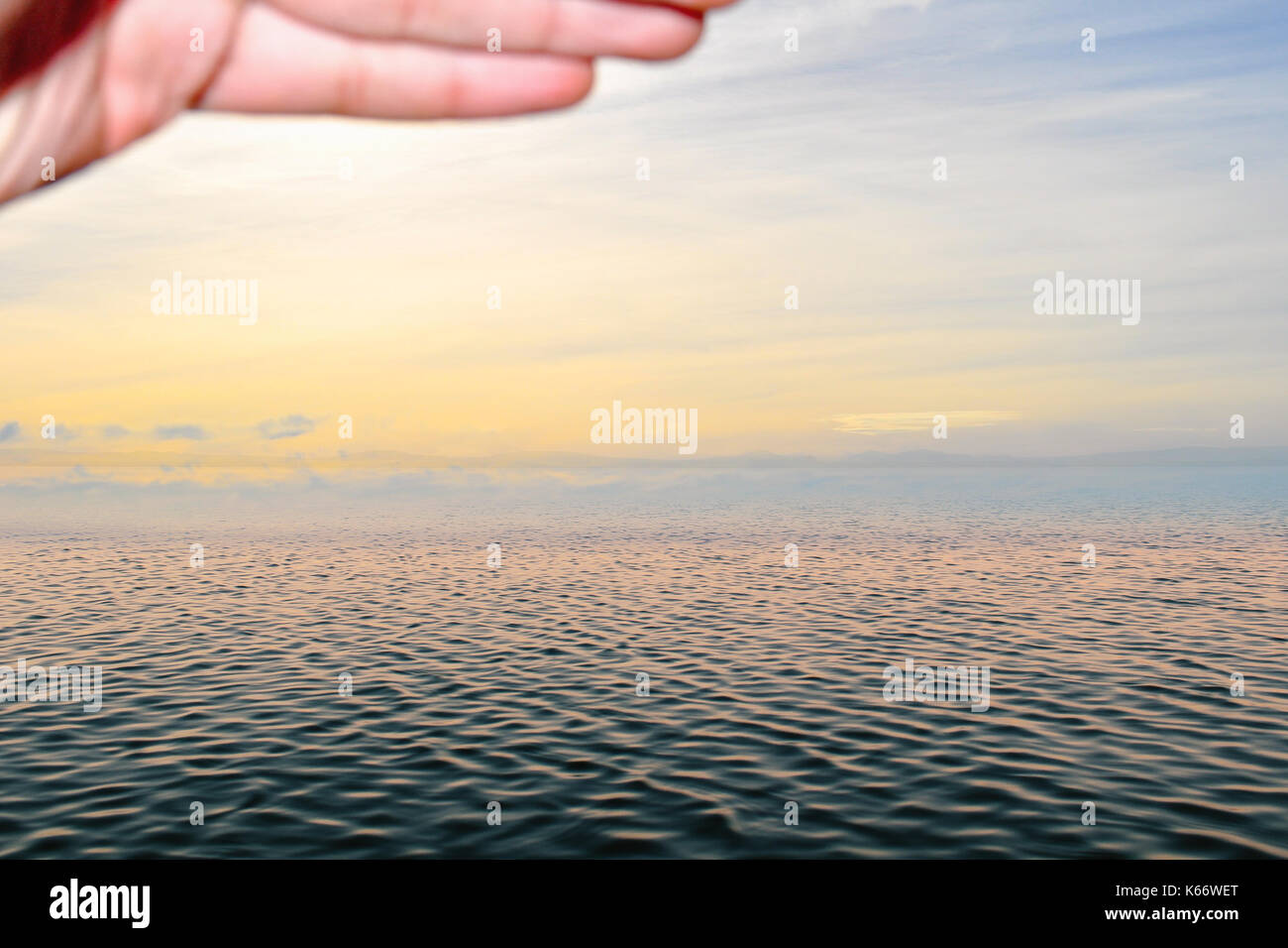 Man staring at the sea skyline Stock Photo - Alamy