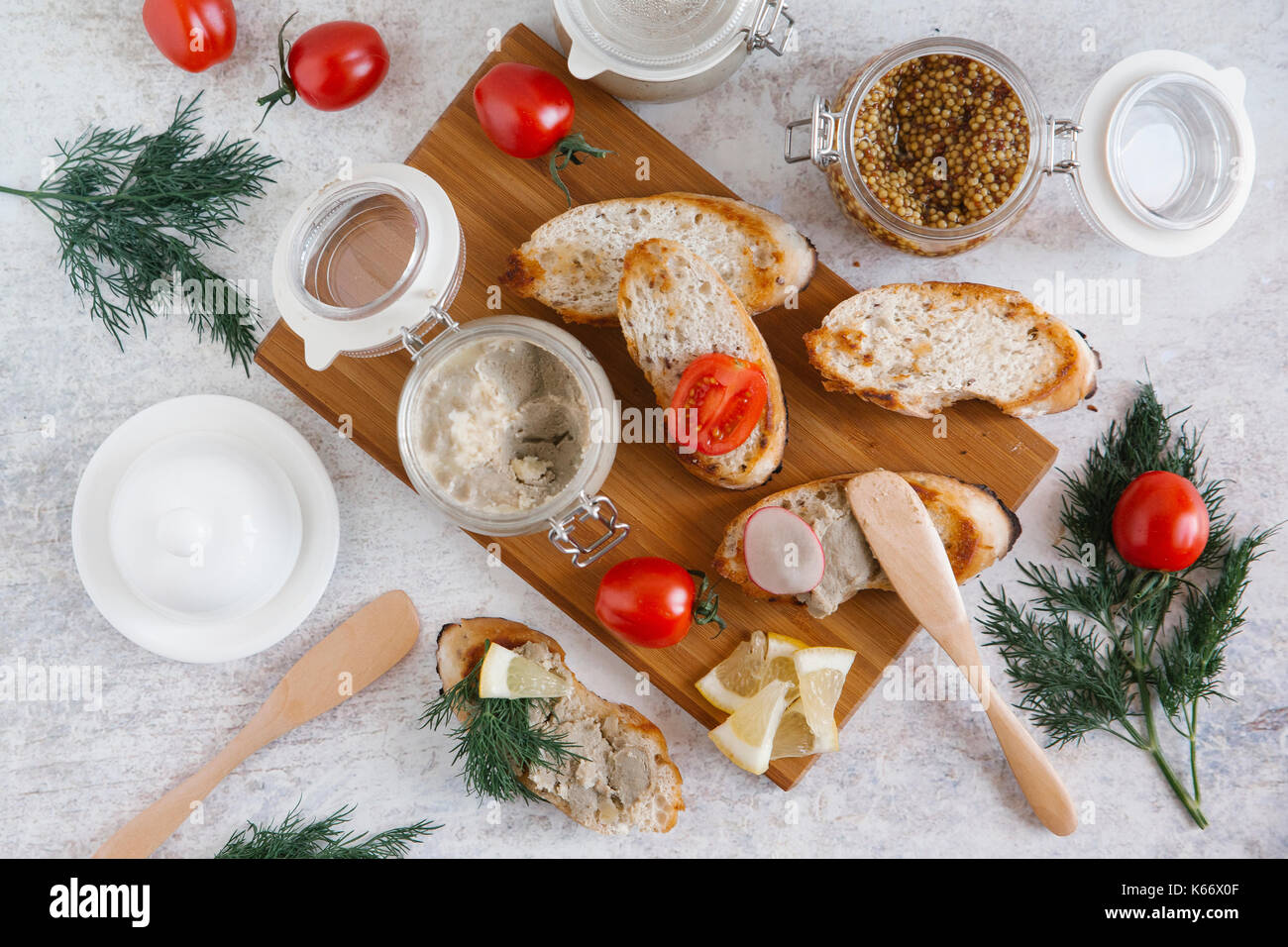 Liver paste and bread on cutting board Stock Photo - Alamy