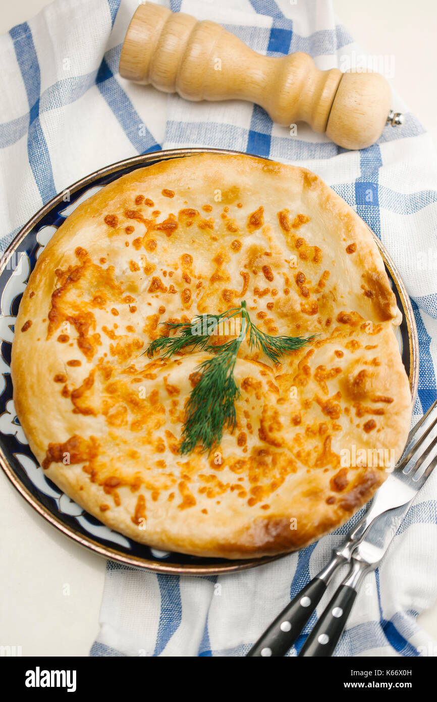 Garnish on bread with melted cheese Stock Photo - Alamy