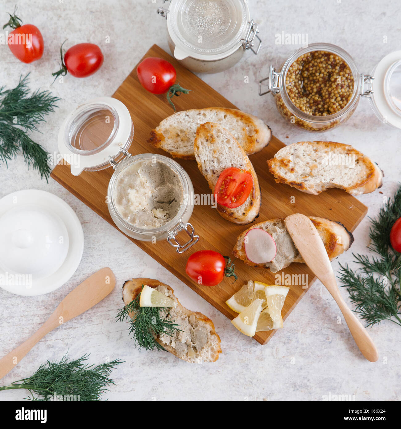 Liver paste and sliced bread on cutting board Stock Photo - Alamy