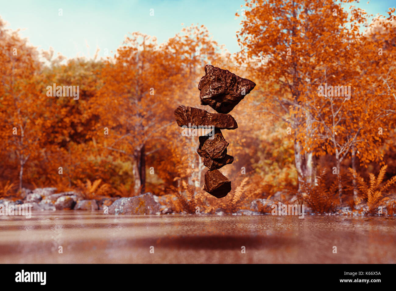 Stack of balancing rocks hovering mid-air in autumn Stock Photo - Alamy