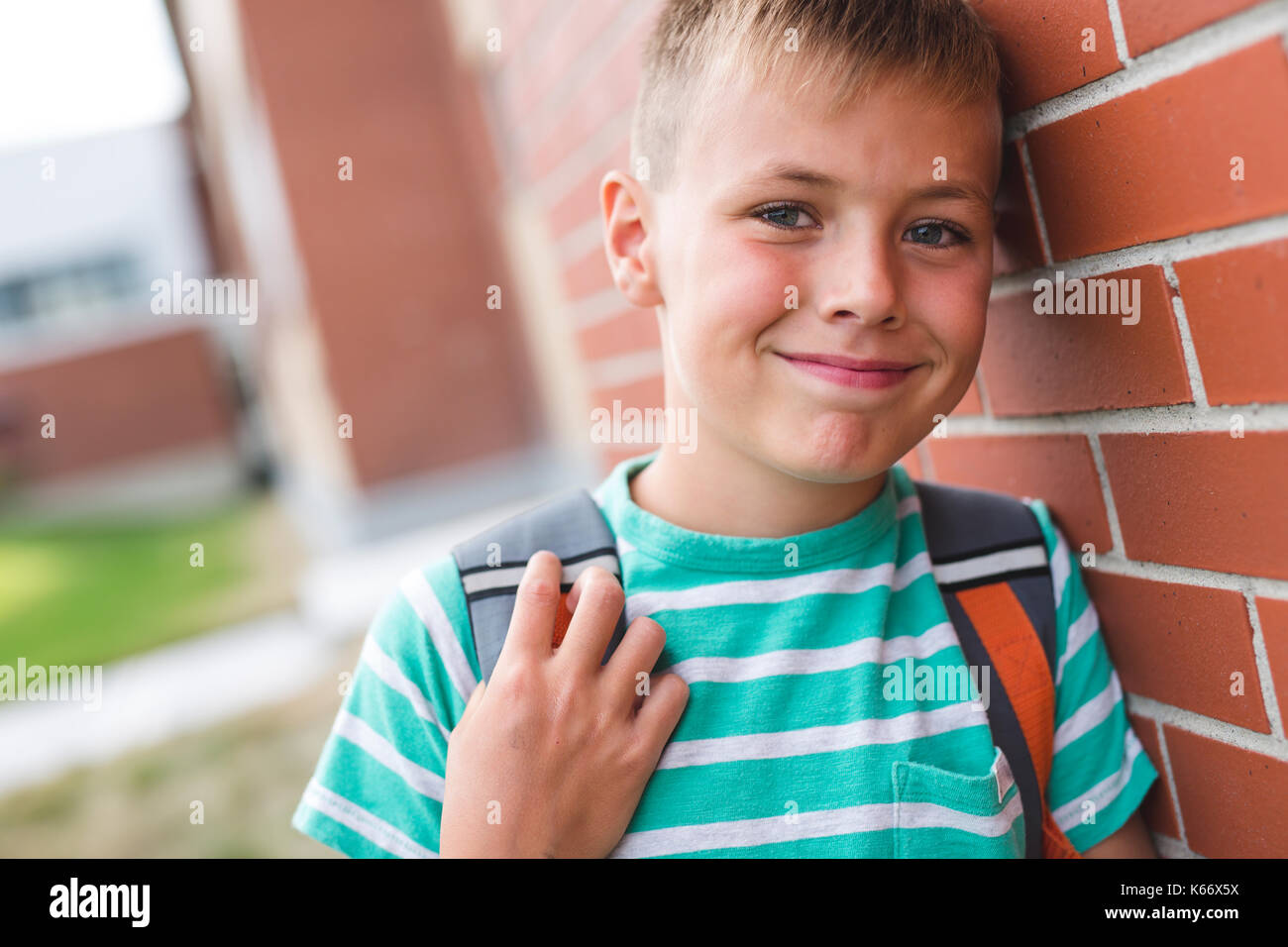 School brick wall boy hi-res stock photography and images - Alamy