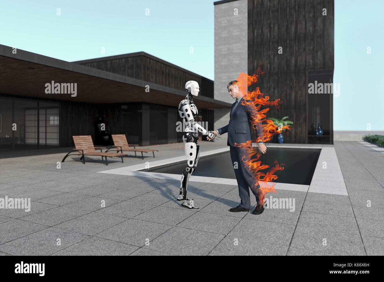 Burning businessman handshaking with cyborg Stock Photo - Alamy