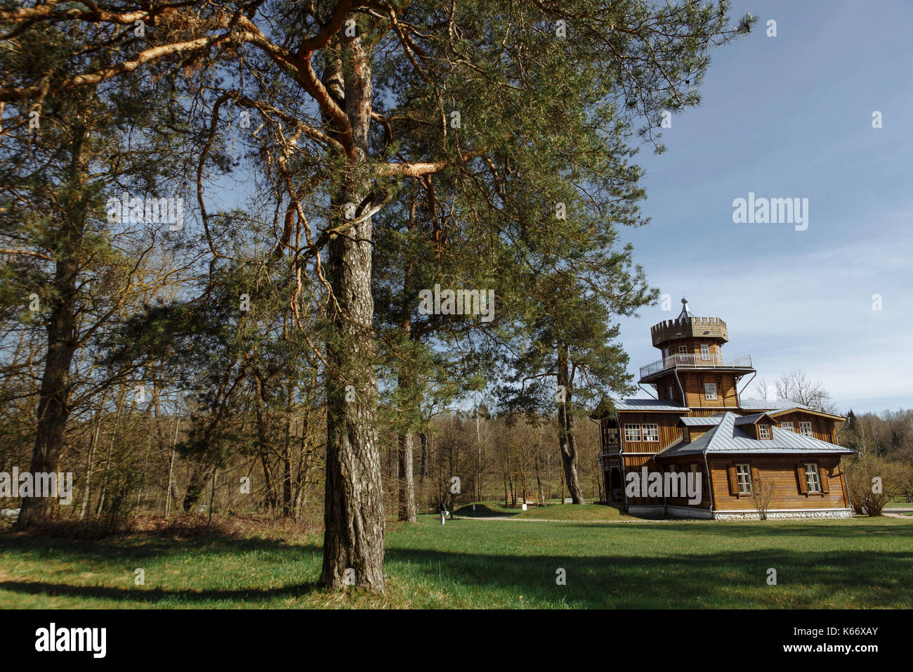 Trees near house in countryside Stock Photo - Alamy
