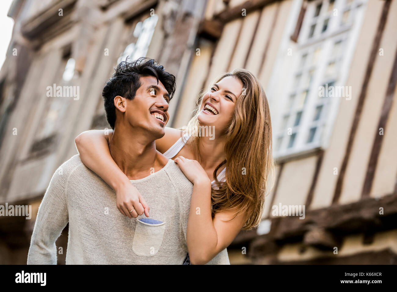 Guy Carrying Girl Over Shoulder