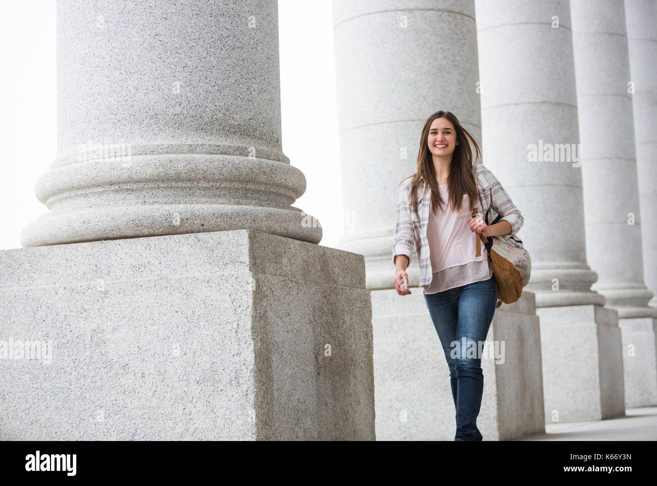 Back view woman carrying backpack hi-res stock photography and images ...