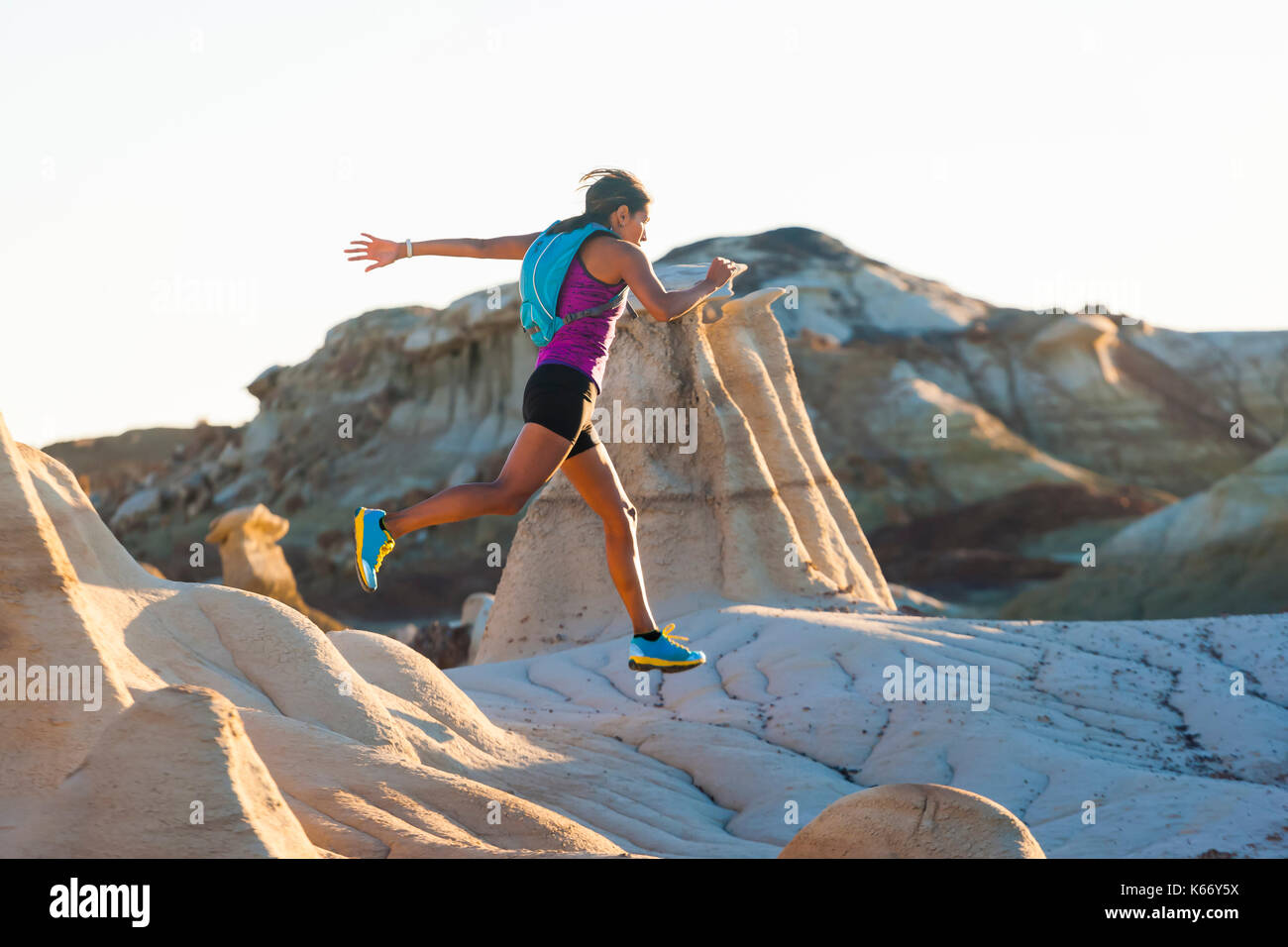Native American woman running in desert Stock Photo - Alamy