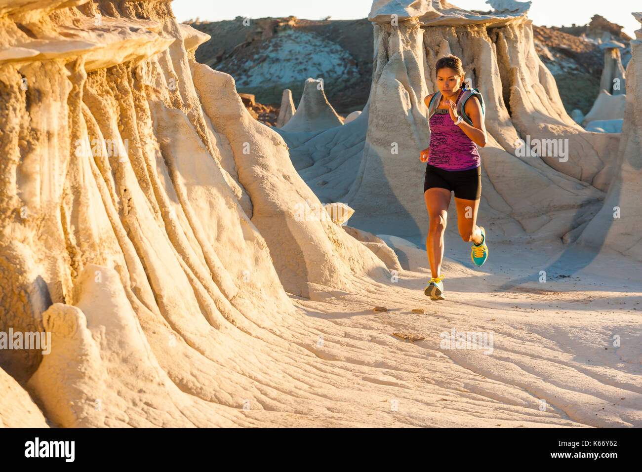 Native American woman running in desert Stock Photo - Alamy