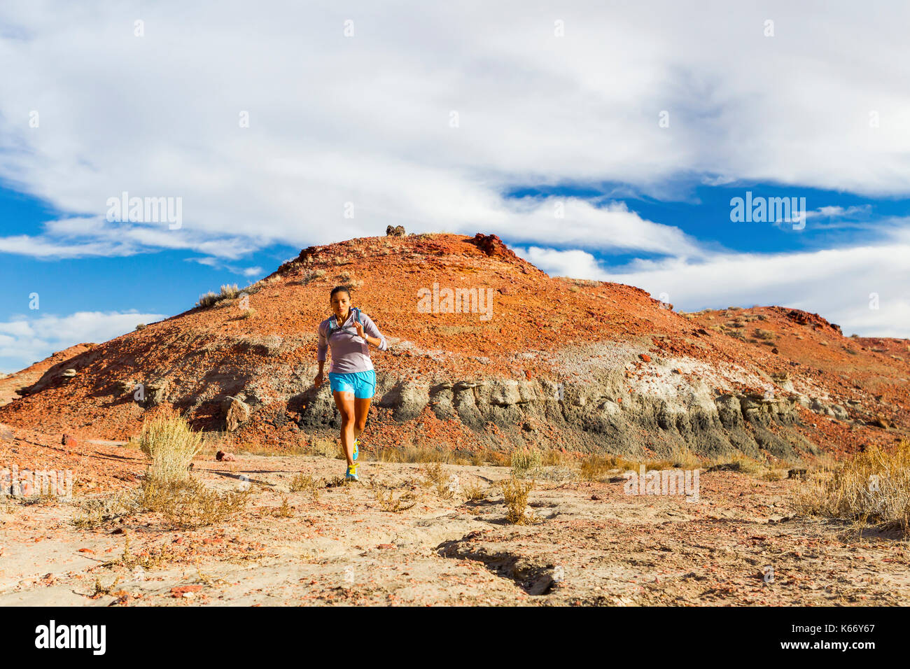Native American woman running in desert Stock Photo - Alamy